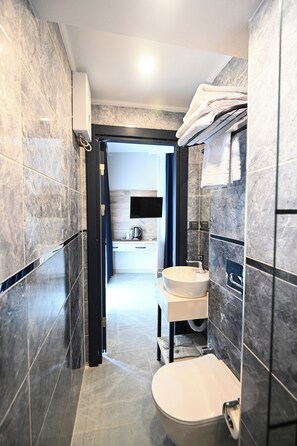 Quarto Deluxe, 1 cama de casal, Vista para a cidade | Secretária, secretária adequada para computadores portáteis 