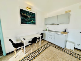 Penthouse Panorâmica, várias camas, varanda, vista para o oceano | Cozinha privada | Uma máquina de café expresso, uma cafeteira/bule, uma chaleira elétrica 