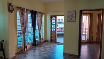 Quarto casal | Área de estar | TV