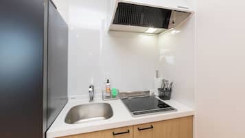 Vila luxo, para não fumantes, de frente para o oceano | Cozinha privada | Geladeira grande, micro-ondas, cooktop