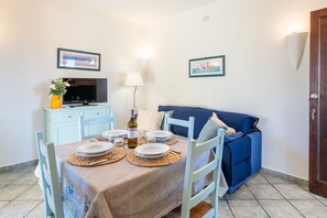 Apartamento, 1 quarto, sacada | Sala de jantar