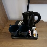 Quarto casal ou duplo luxo, sacada, vista para a montanha | Ferros/tábuas de passar roupa, Wi-Fi de cortesia