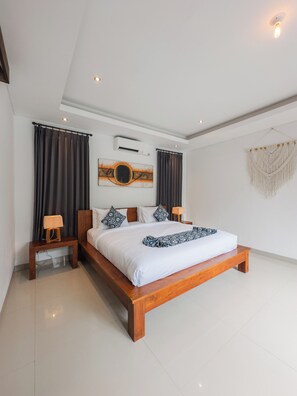 Vila, 2 quartos, vista para a piscina | Escrivaninha, espaço de trabalho para notebook, Wi-Fi de cortesia