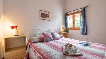 Apartamento, 2 quartos, varanda, vista para o jardim | 2 quartos