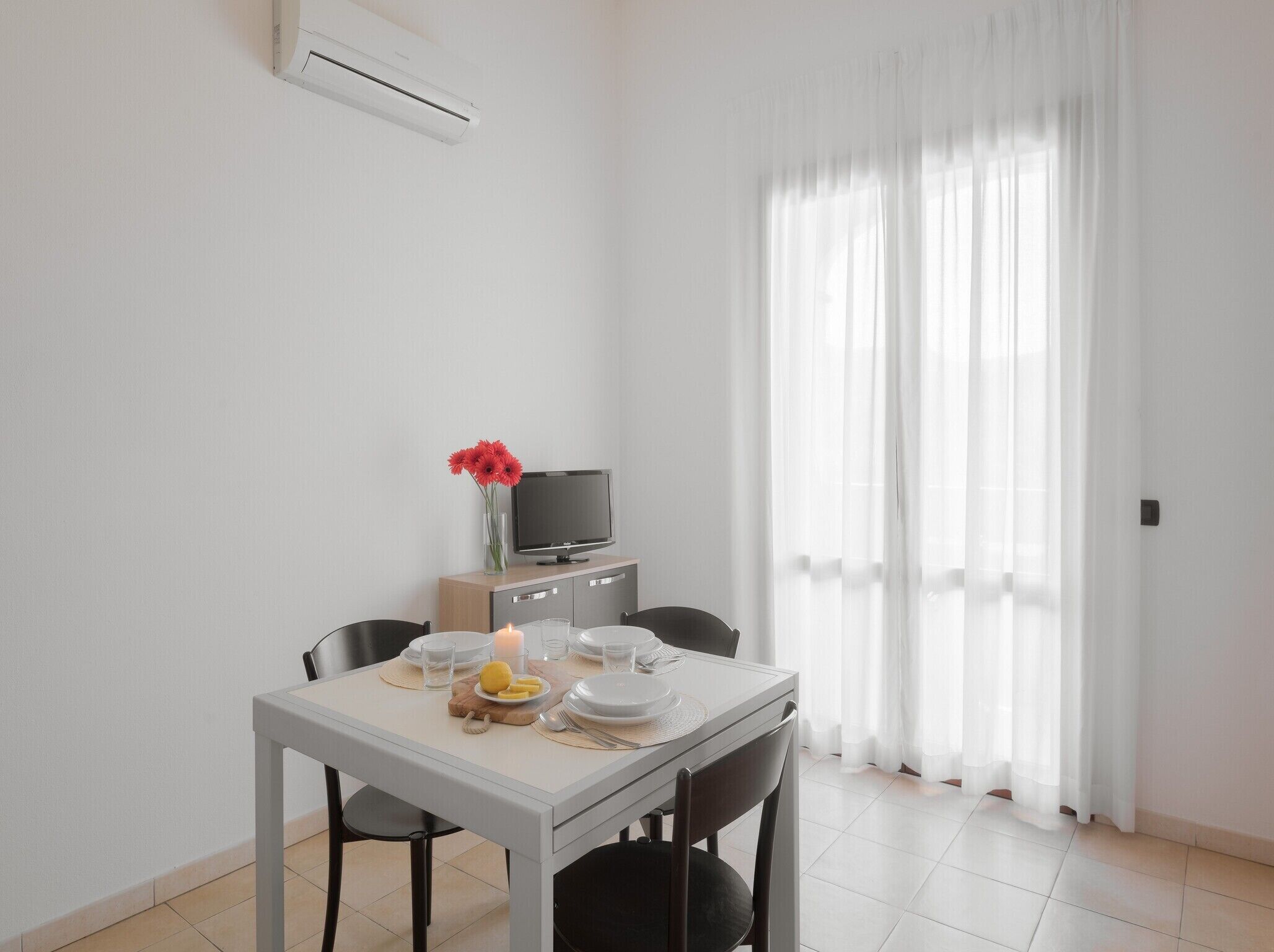 Apartamento, 1 quarto, terraço | Sala de jantar