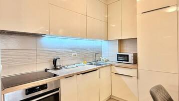 Apartamento de Luxo, varanda, Vista para a cidade | Cozinha privada