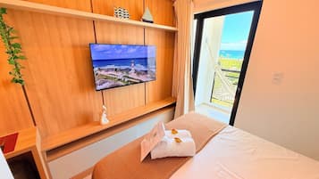 Apartamento Deluxe | Secretária, secretária adequada para computadores portáteis