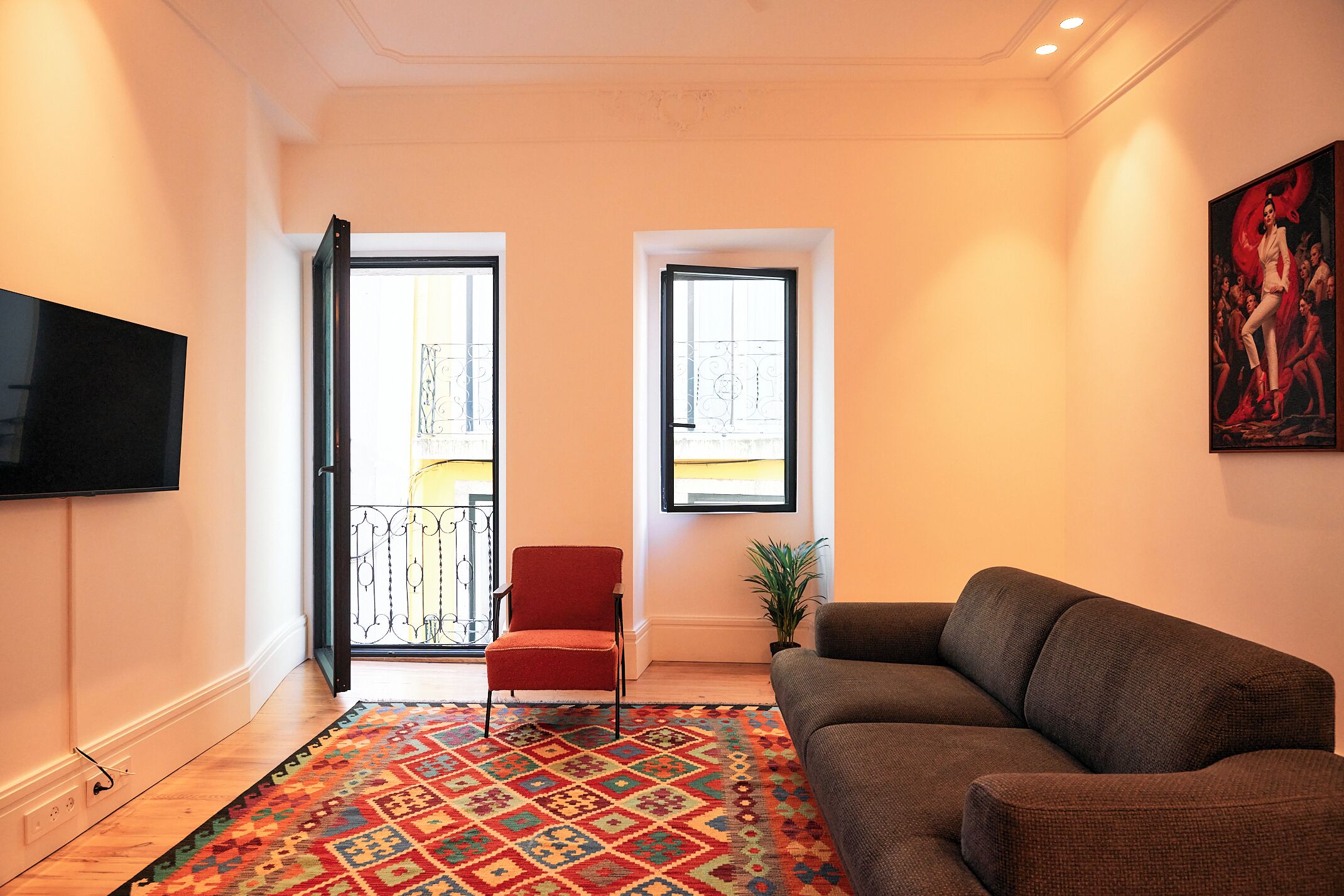 Apartamento conforto, sacada, vista para a cidade | Área de estar