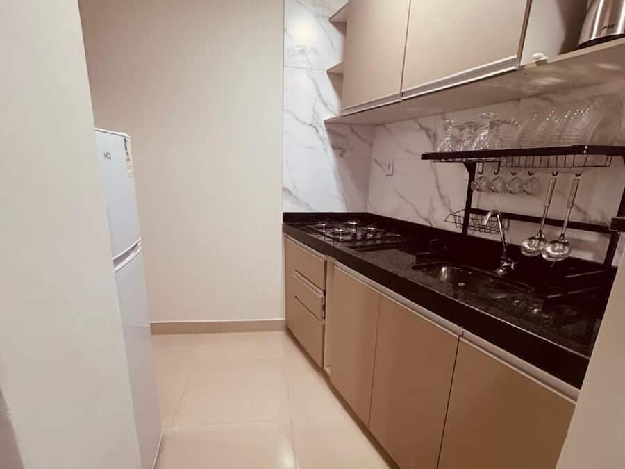 Apartamento premier | Cozinha privada | Geladeira, chapa, cozinha com ilha