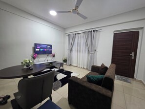 Apartamento luxo, vista para a montanha | Área de estar