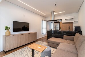 Apartamento | Sala de estar | Smart TV de 40 polegadas com canais digitais 