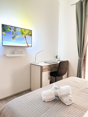 Apartamento (A2) | Ferro/tábua de engomar, Wi-fi grátis 