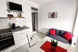 Apartamento (A1) | Cozinha privada | Geladeira, fogão, cooktop, lava-louças