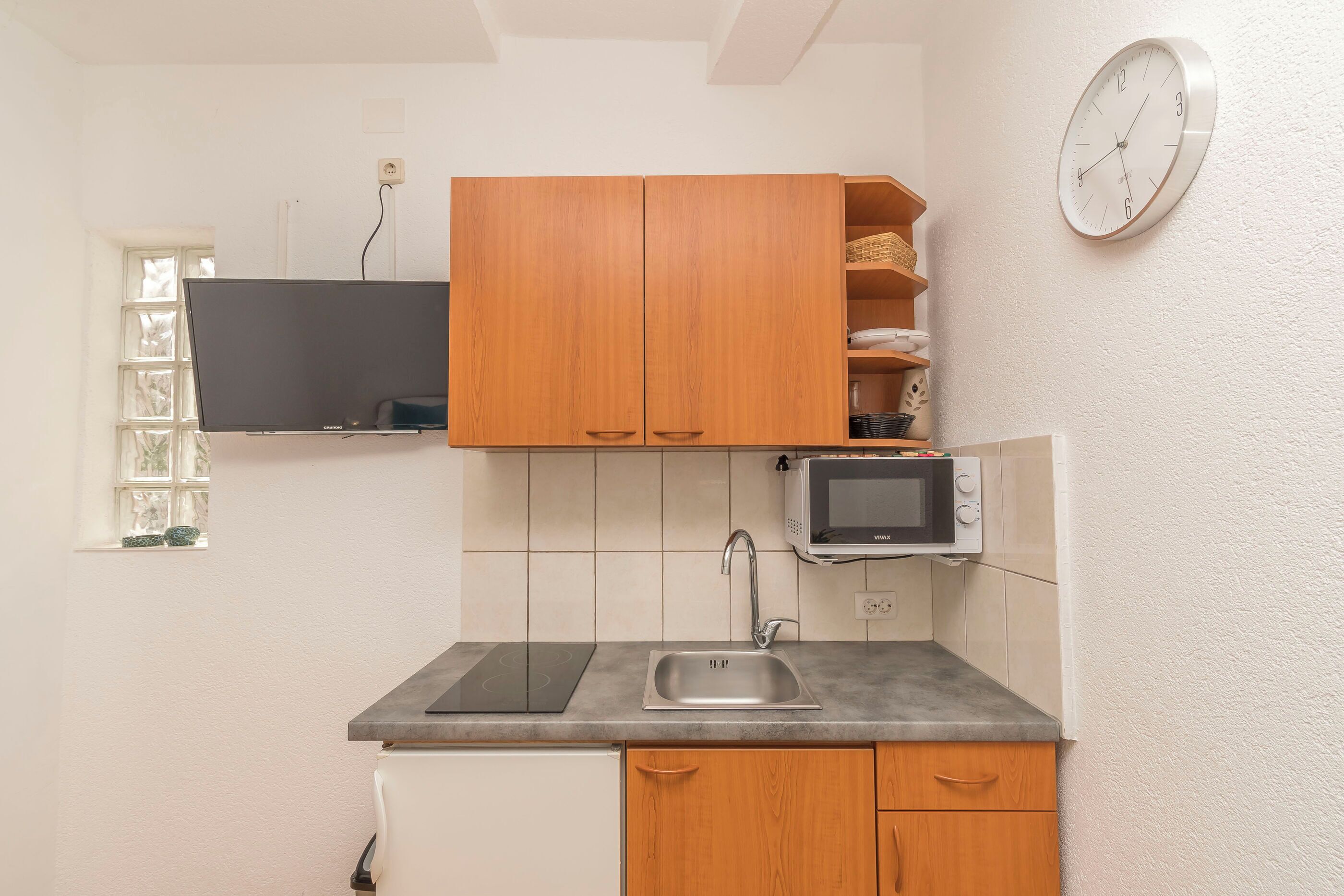 Estúdio (A1) | Cozinha privada | Frigobar, micro-ondas, cooktop, chaleira elétrica