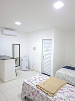 Quarto Triplo Clássico | Wi-fi grátis, roupa de cama fornecida 