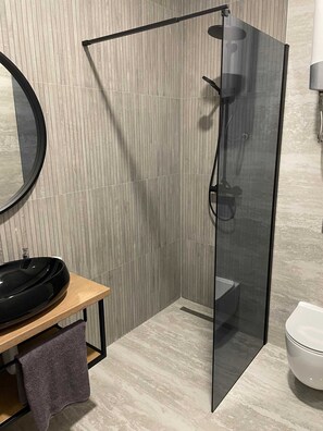 Apartamento | Casa de banho | Um secador de cabelo 