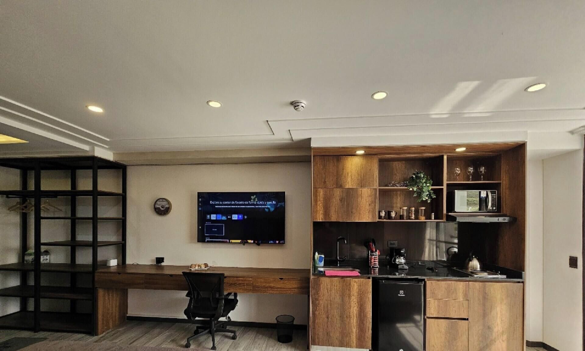 Suite Deluxe, 2 camas de casal, casa de banho privativa | Cofre no quarto, secretária 