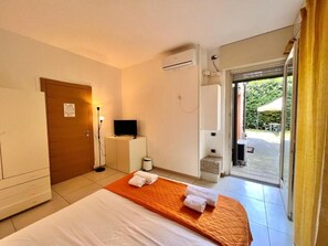 Quarto casal conforto, vista para o jardim | Wi-Fi de cortesia