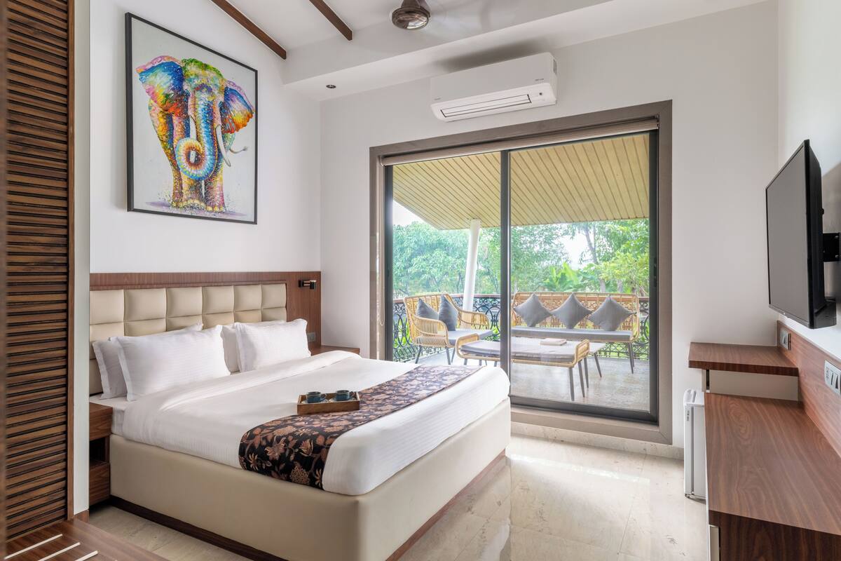 Villa Comfort, vista para o jardim | Ferro/tábua de engomar, Wi-fi grátis