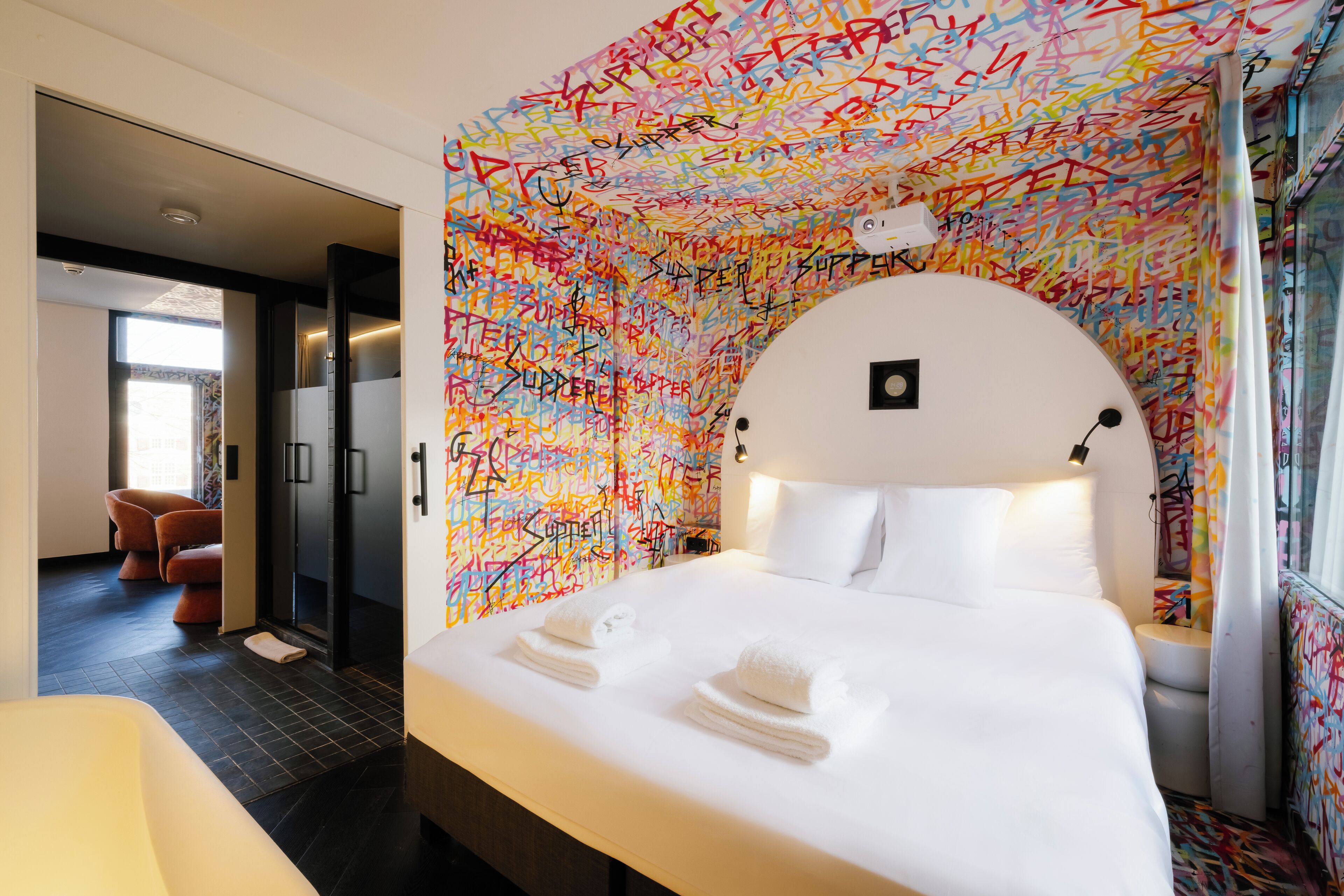 Suite Design, varanda, Vista para a cidade | Roupa de alta qualidade, minibar grátis, cofre no quarto 