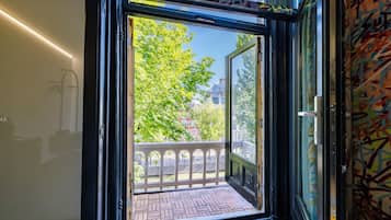 Suíte design, sacada, vista para a cidade | Terraço/pátio