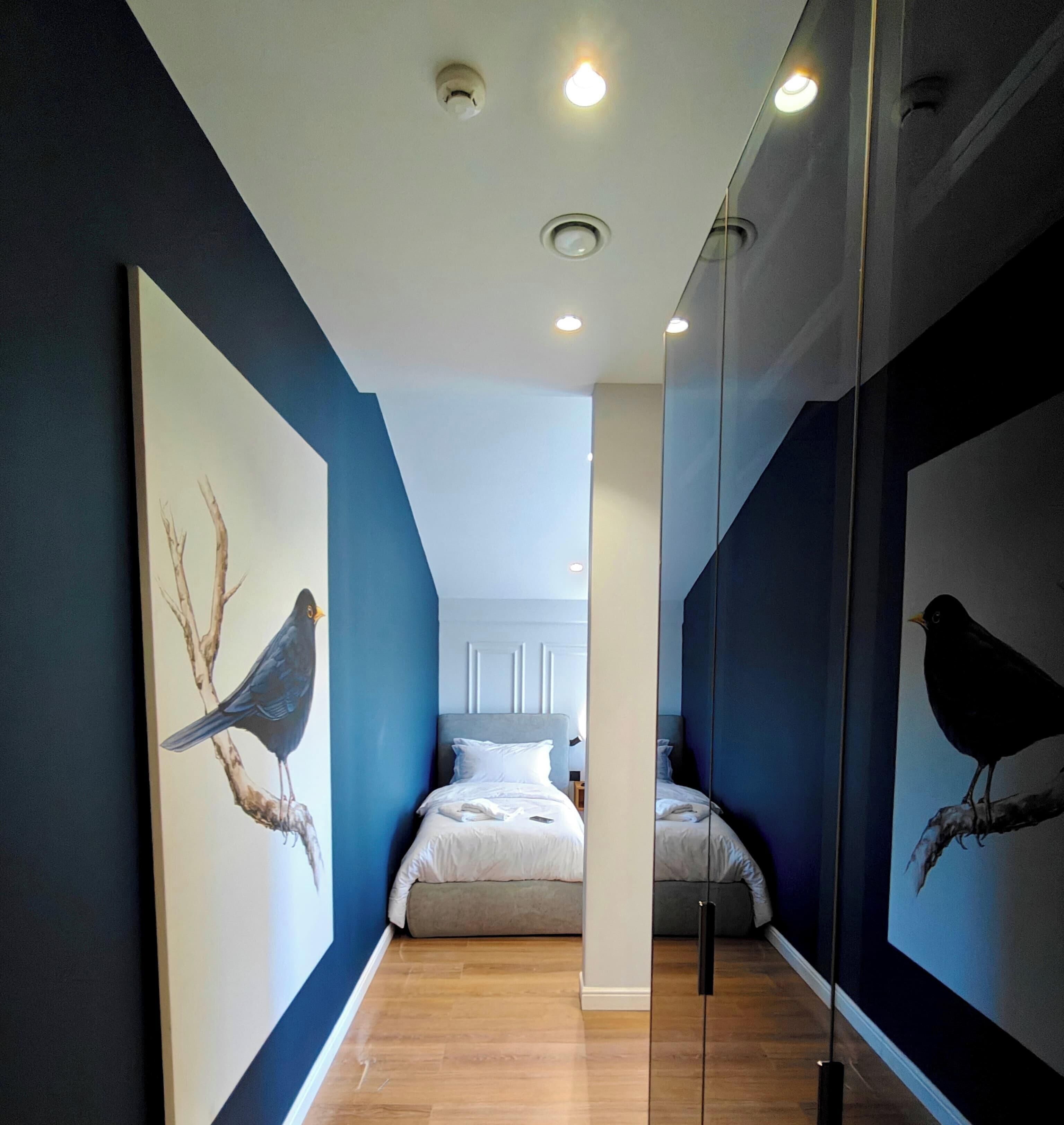 Quarto Triplo Deluxe, vista para a baía | Cofre no quarto, quartos insonorizados, Wi-fi grátis 