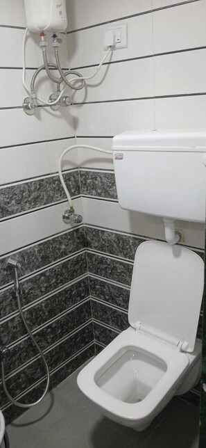 Quarto casal, vista para a cidade | Banheiro | Toalhas de banho 