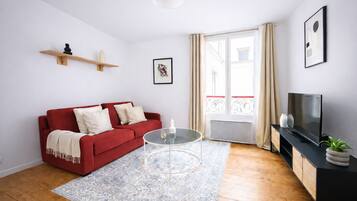 Apartamento | Área de estar | TV de tela plana