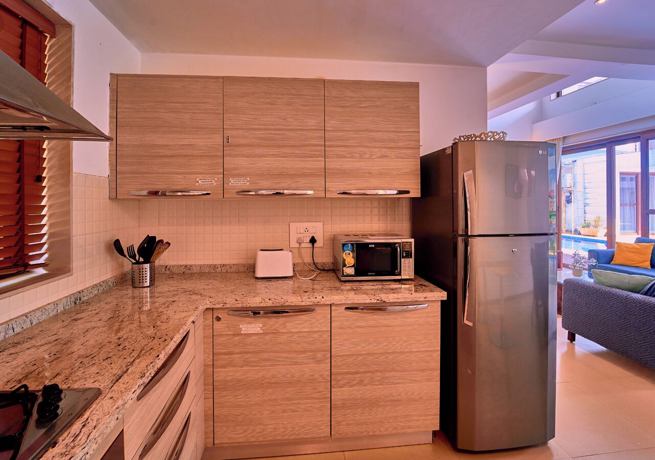 Vila, sacada, vista para a piscina | Cozinha privada