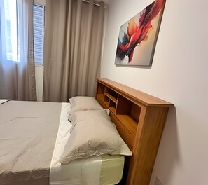 Apartamento básico | Camas Select Comfort, Wi-Fi de cortesia, roupa de cama