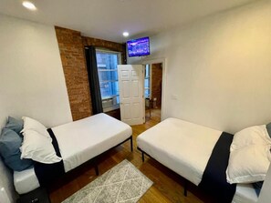 Wi-Fi de cortesia, roupa de cama