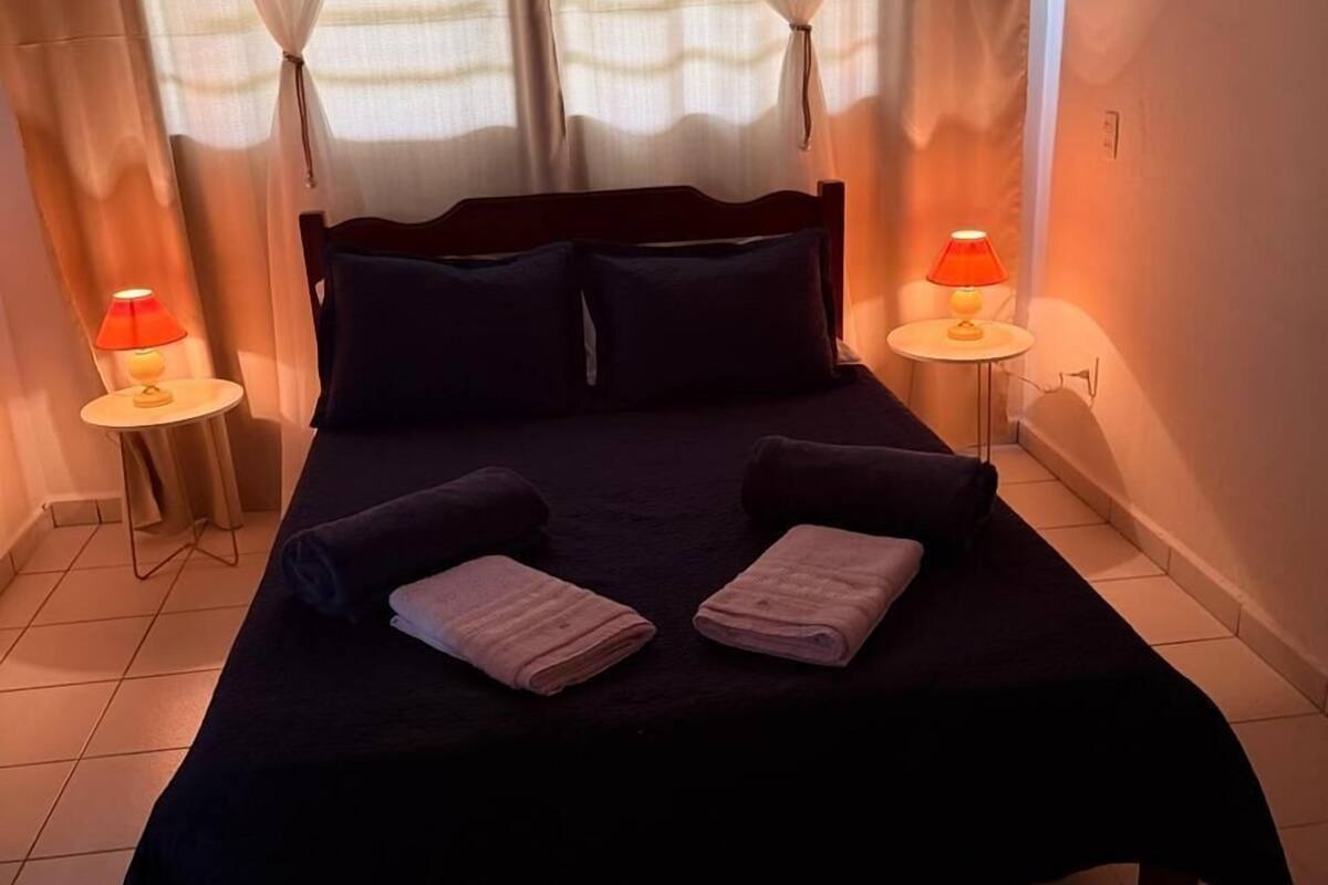 Quarto Triplo Clássico, vista para o jardim | Wi-fi grátis