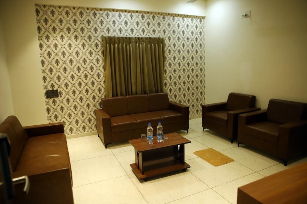 Quarto premium | Área de estar