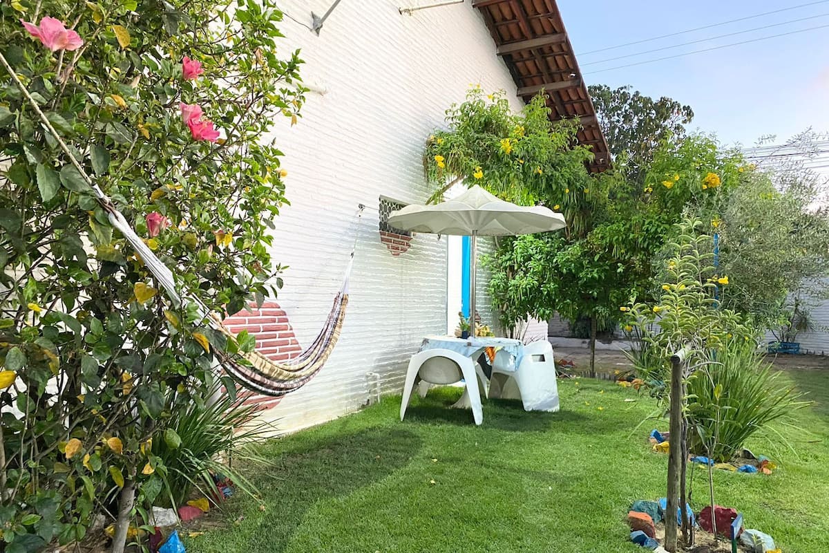 Quarto triplo, vista para o jardim | Wi-Fi de cortesia