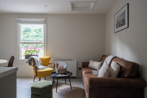 Apartamento Deluxe, varanda, Vista para a cidade | Sala de estar