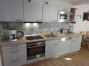 Casa | Cozinha privada | Cadeirão de bebê