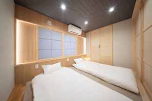 Suite Superior, 2 quartos, não fumadores, casa de banho privativa | Secretária, Wi-fi grátis, roupa de cama fornecida