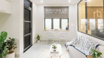 Apartamento Deluxe, varanda, Vista para a cidade | Secretária, ferro/tábua de engomar, Wi-fi grátis