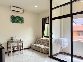 Roomsuit 2 | Frigobar, escrivaninha, camas extras/dobráveis (sobretaxa)