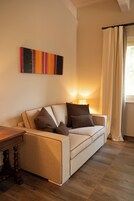 Apartamento Signature, vista para a montanha | Sala de estar