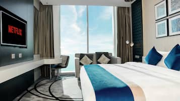 Suite-Estúdio Básica, Vista para a cidade | Cofre no quarto, cortinas/cortinados opacos, quartos insonorizados