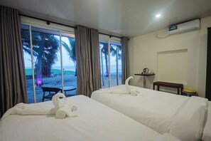 Quarto standard, de frente para a praia | Cofres nos quartos, Wi-Fi de cortesia