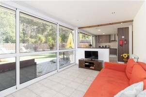 Villa Superior, 2 quartos, varanda, vista para o jardim | Sala de estar