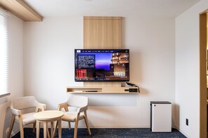 Quarto Twin Deluxe, várias camas, não fumadores, vista para a montanha | Interior