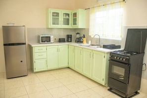 Apartamento, 2 quartos, varanda, vista para o jardim | Interior