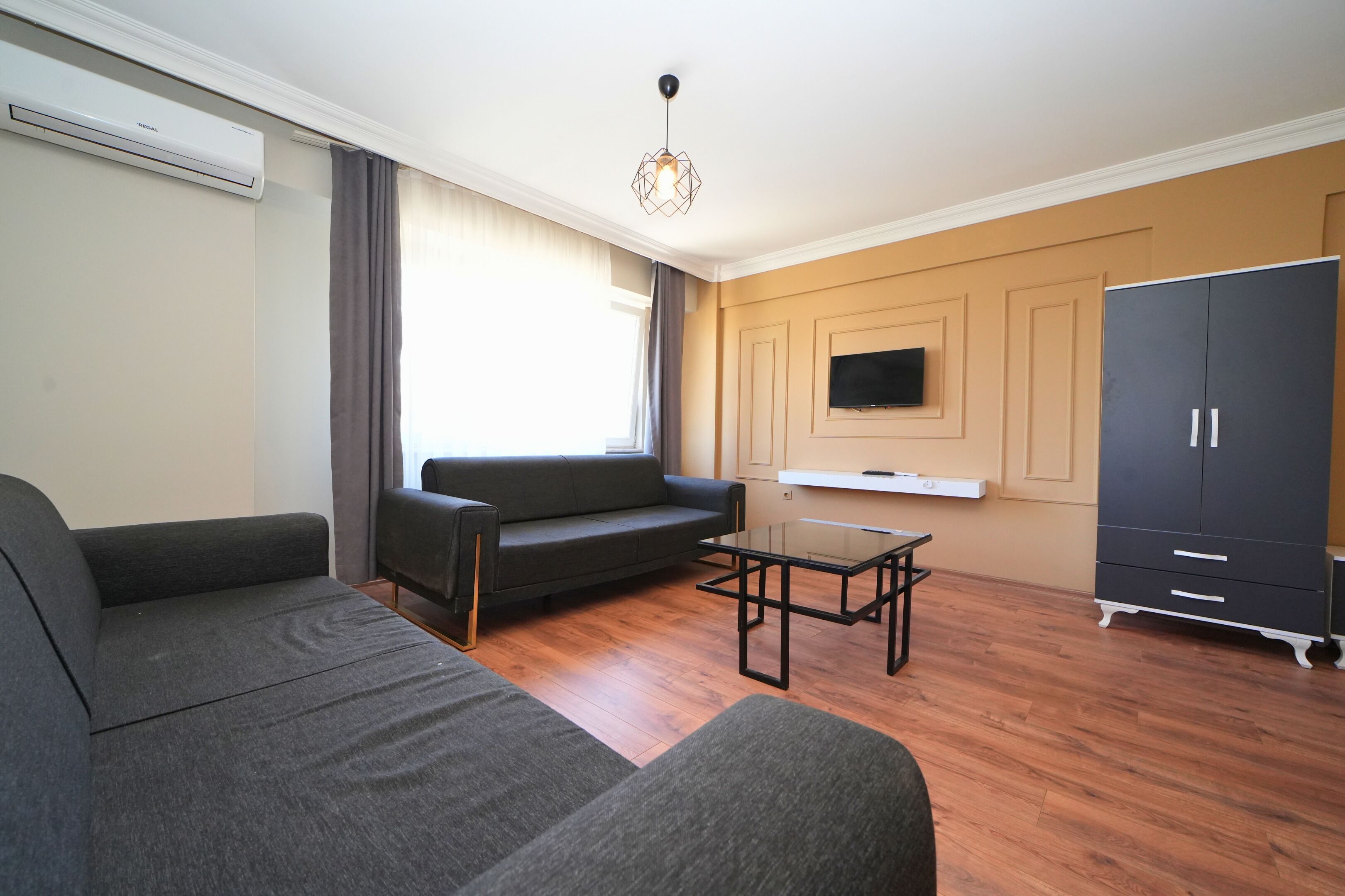 Apartamento standard, 1 cama de casal e sofá-cama, sacada | Área de estar