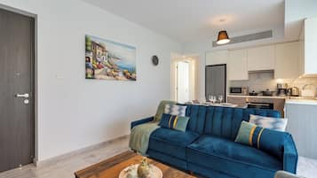 Apartamento, 1 cama de casal e sofá-cama, cozinha, vista para a cidade | Área de estar | Smart TV, Netflix, serviços de streaming