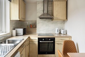 Estúdio superior | Cozinha privada | Fogão, cooktop, torradeira