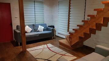 Apartamento, varanda, Vista para a cidade | Sala de estar