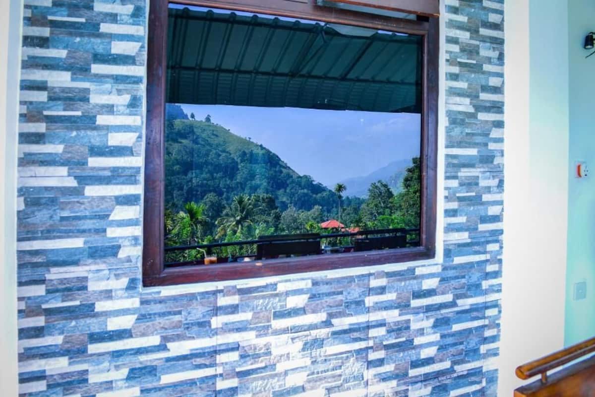 Quarto Deluxe, varanda, vista para a montanha | Interior